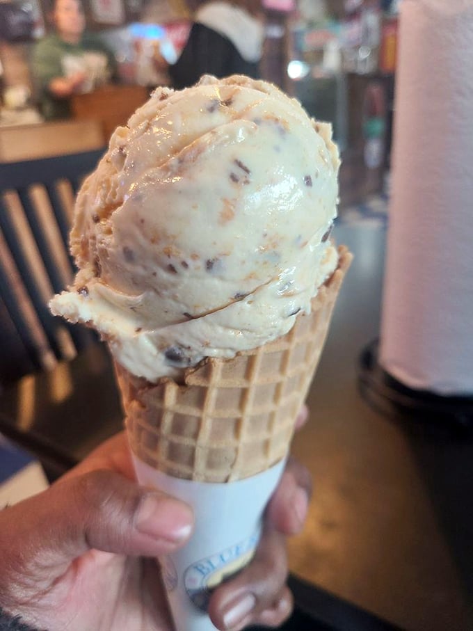 The golden ratio of waffle cone to ice cream exists, and this masterpiece has achieved it with buttery, crunchy perfection.