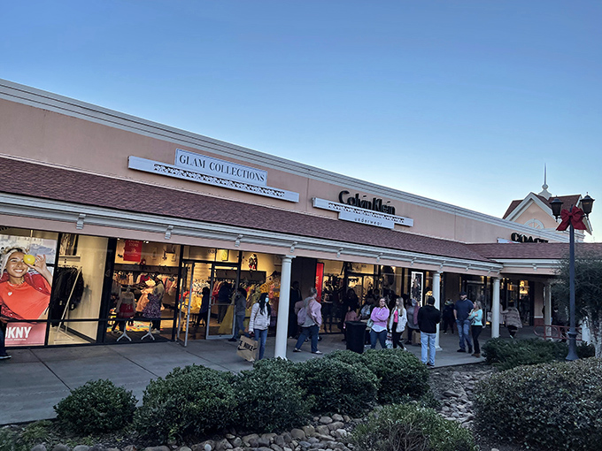 As evening approaches, Calvin Klein and neighboring shops light up like beacons for night owls with shopping stamina.