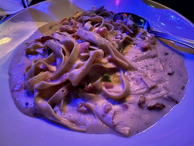 Capone's Carbonara: A creamy, dreamy pasta that's so good, it should be illegal. Don't worry, we won't rat you out.