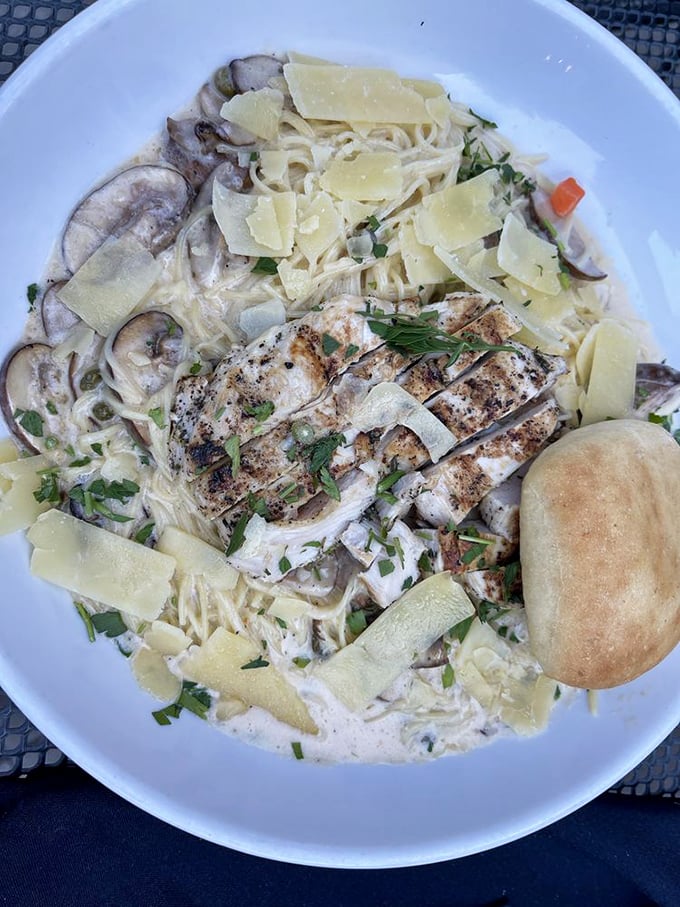 Pasta that doesn't just sit on the plate&mdash;it performs! Grilled chicken atop creamy fettuccine with mushrooms and fresh herbs.