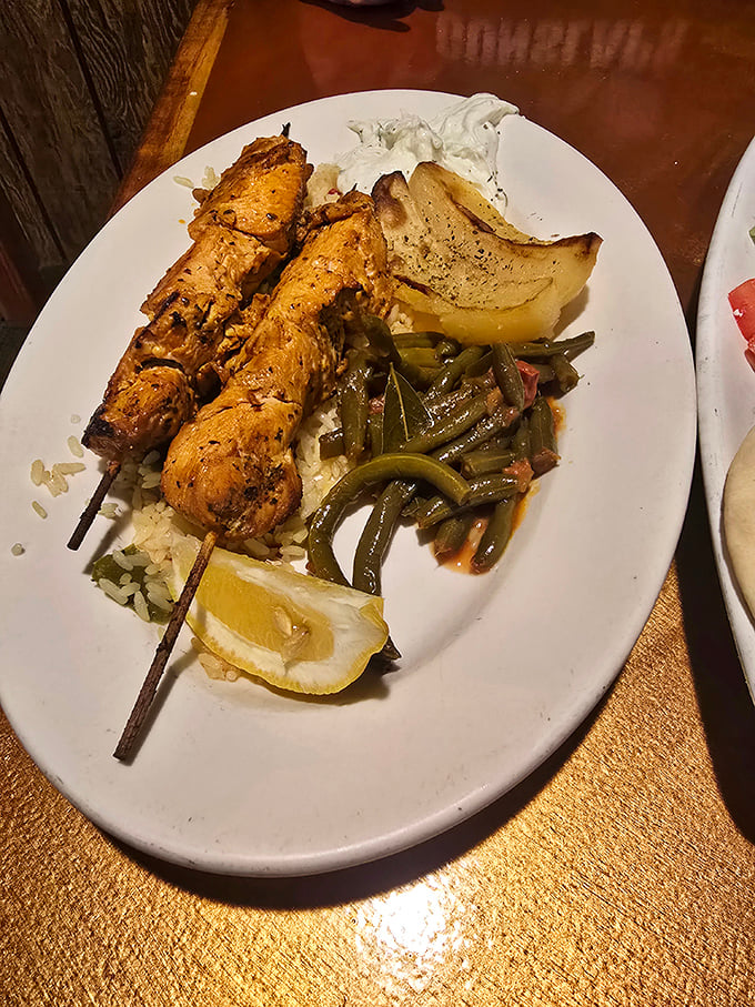 Chicken souvlaki that's traveled all the way from Athens to your plate, bringing along its passport of herbs, char marks, and juicy perfection.