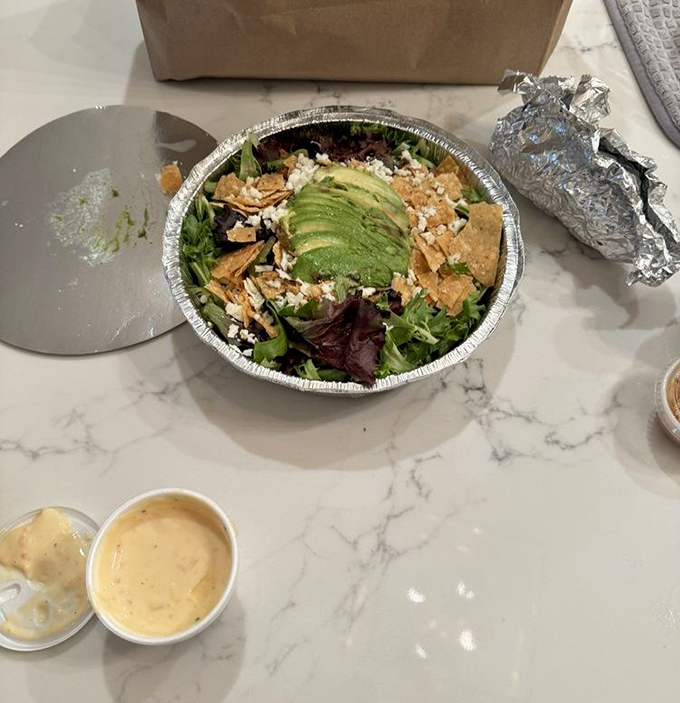 This isn't just any salad&mdash;it's what happens when vegetables finally get the respect they deserve. That avocado is practically posing for its glamour shot.