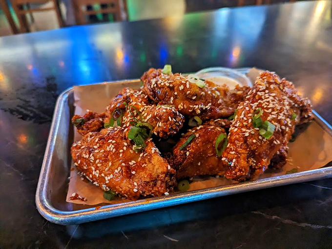 These wings aren't just fried&mdash;they're transformed into sticky, sweet-spicy morsels that make sharing an act of true friendship.