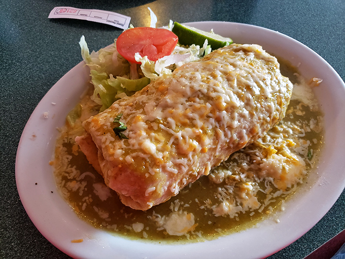 Bathed in verde sauce like it's at a spa day, this chimichanga proves that sometimes the best things in life come smothered in green goodness.