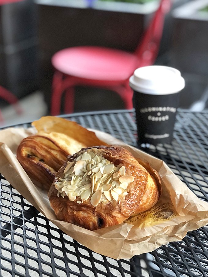 This chocolate almond croissant isn't just breakfast, it's an edible argument against moderation, topped with a snowfall of sliced almonds.