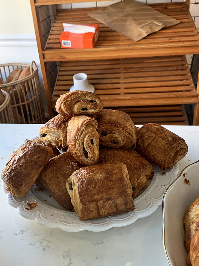 Classic croissants arranged like a still-life painting, except this artwork disappears quickly once hungry customers arrive. 