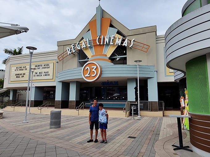 Regal Cinemas: where smart shoppers take a two-hour intermission between wallet workouts. Nothing says "shopping break" like air conditioning and popcorn.