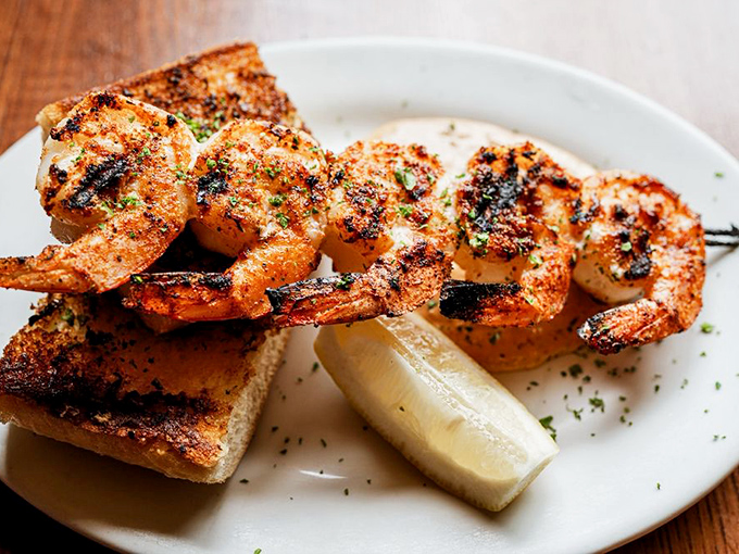 These aren't just shrimp; they're perfectly seasoned flavor bombs with char marks that should be framed in a culinary museum.