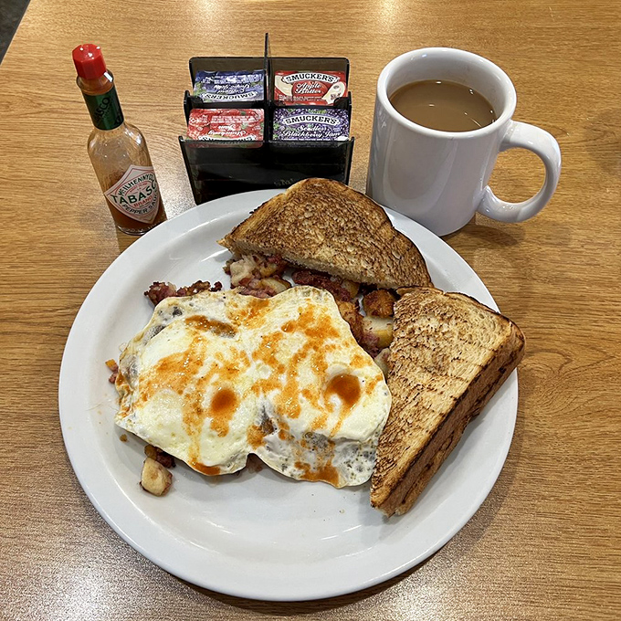 This isn't just breakfast&mdash;it's a savory morning symphony where eggs, gravy, and toast perform in perfect harmony. The coffee is the conductor.