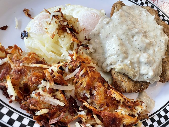 This isn't just country fried steak&mdash;it's a masterclass in comfort. The crispy exterior gives way to tender beef while that gravy performs miracles on your taste buds.
