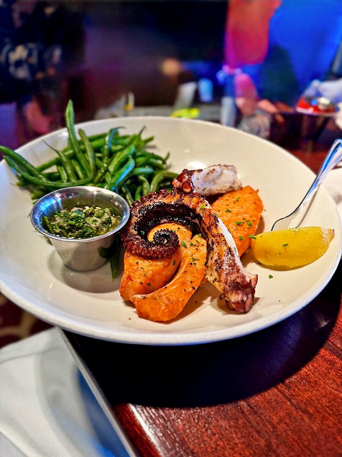 This isn't just octopus&mdash;it's a masterpiece of land and sea. The crispy salmon and tender tentacle are plated with artistic precision.