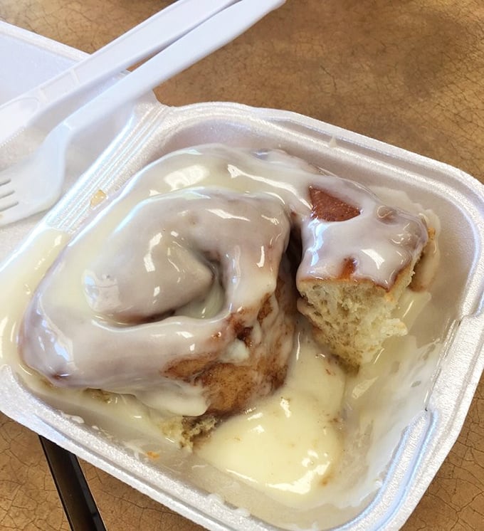 The icing-to-roll ratio here deserves scientific study. If happiness were edible, it would look exactly like this cinnamon masterpiece.