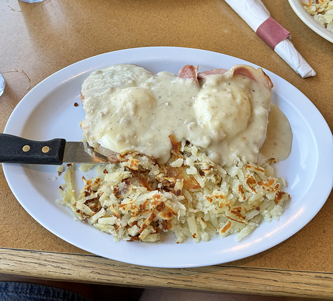 An omelet that's dressed for success with a side of crispy potato perfection. Like a power suit for your breakfast plate.