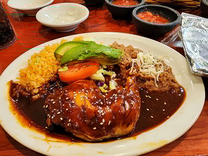 The chicken enchilada with its blanket of rich sauce is like comfort food that went to culinary school and came back with honors.