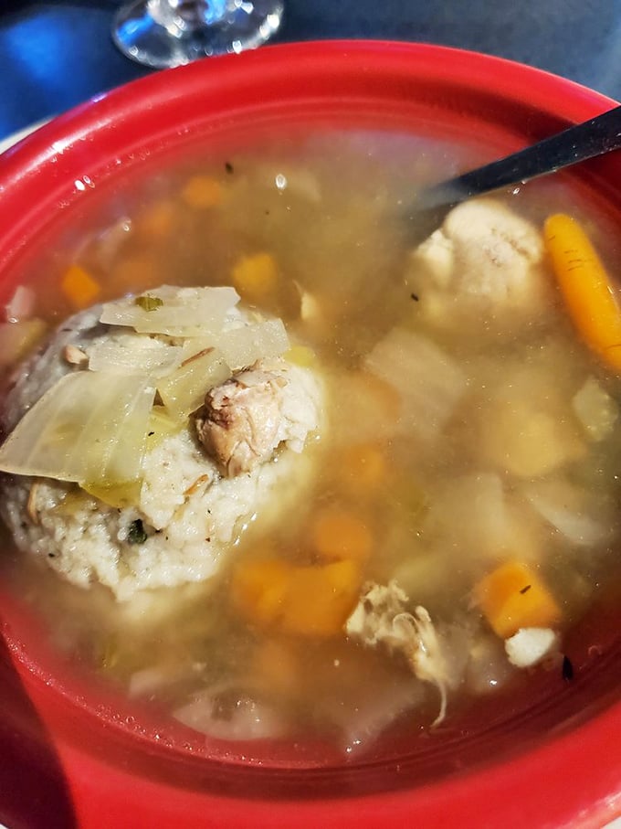 Look at that broth clarity! Like liquid amber with vegetables playing hide-and-seek around a perfect matzo ball.