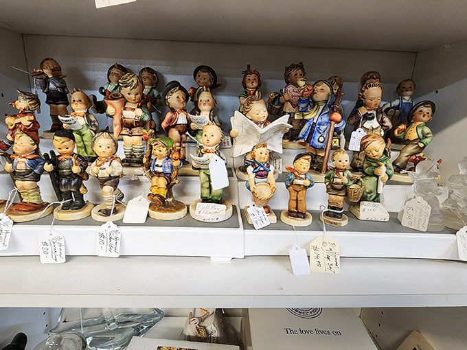 These Hummel-esque figurines stand in silent judgment, their cherubic faces saying, "Yes, you absolutely need to adopt all of us."