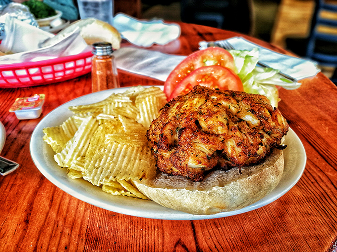 The fish sandwich arrives with zero pretension and maximum flavor – a masterclass in the art of seafood simplicity.