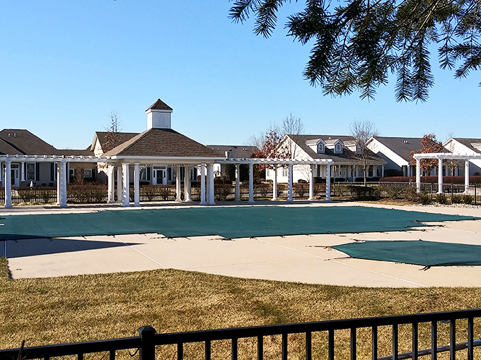 Four Seasons at Historic Cranbury awaits summer days, surrounded by white columns that say "we take our leisure seriously" in the most delightful way possible.