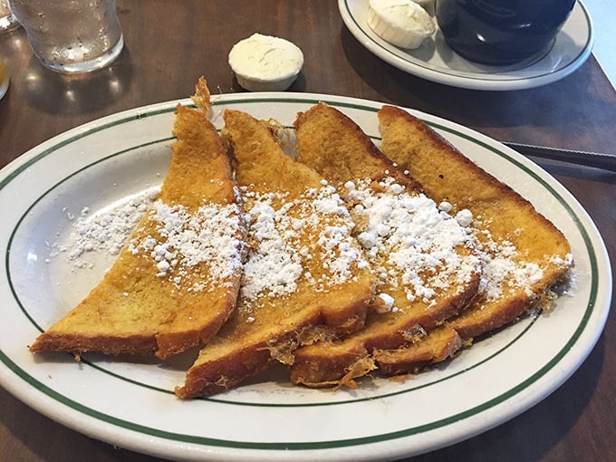 French toast so perfectly golden and dusted with powdered sugar, it makes you wonder why anyone would ever settle for regular toast again.