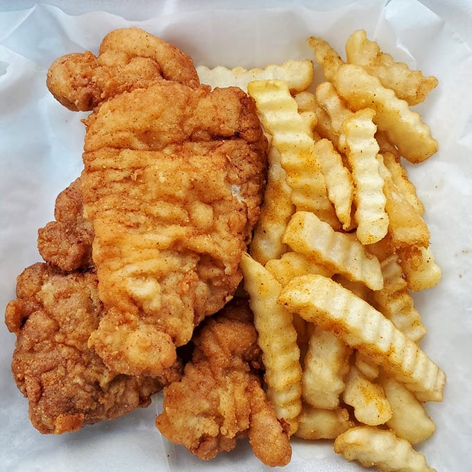 Fried chicken that's audibly crunchy on the outside, juicy on the inside, and served with crinkle-cut fries that are basically potato perfection in corrugated form.