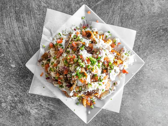 Greek nacho fries: where Mediterranean meets game day snacking in a glorious fusion that would make both Zeus and Guy Fieri nod in approval.
