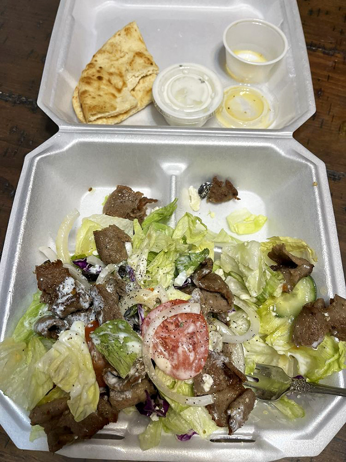 This Greek salad topped with gyro meat isn't just a meal&mdash;it's edible architecture with layers of Mediterranean brilliance.