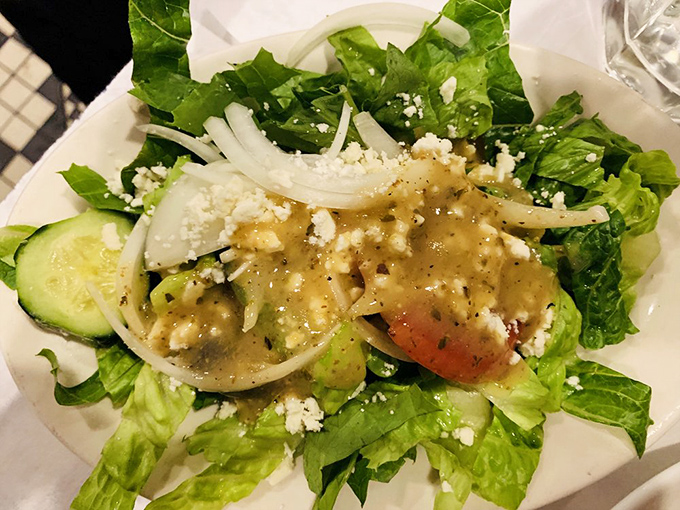 This isn't just a salad; it's summer in Greece captured on a plate. The feta practically demands its own passport.