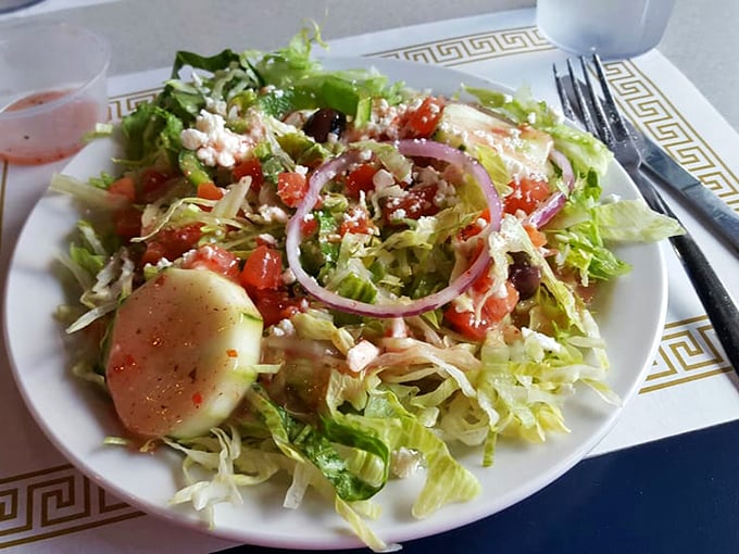 This isn't just a Greek salad; it's a Mediterranean color palette where every forkful delivers a perfect balance of briny, tangy, and fresh.