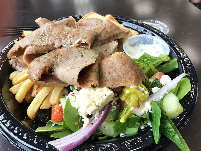 Who needs a plane ticket when this gyro platter delivers Greece on a plate? The fries, salad, and meat create a Mediterranean trifecta of satisfaction.
