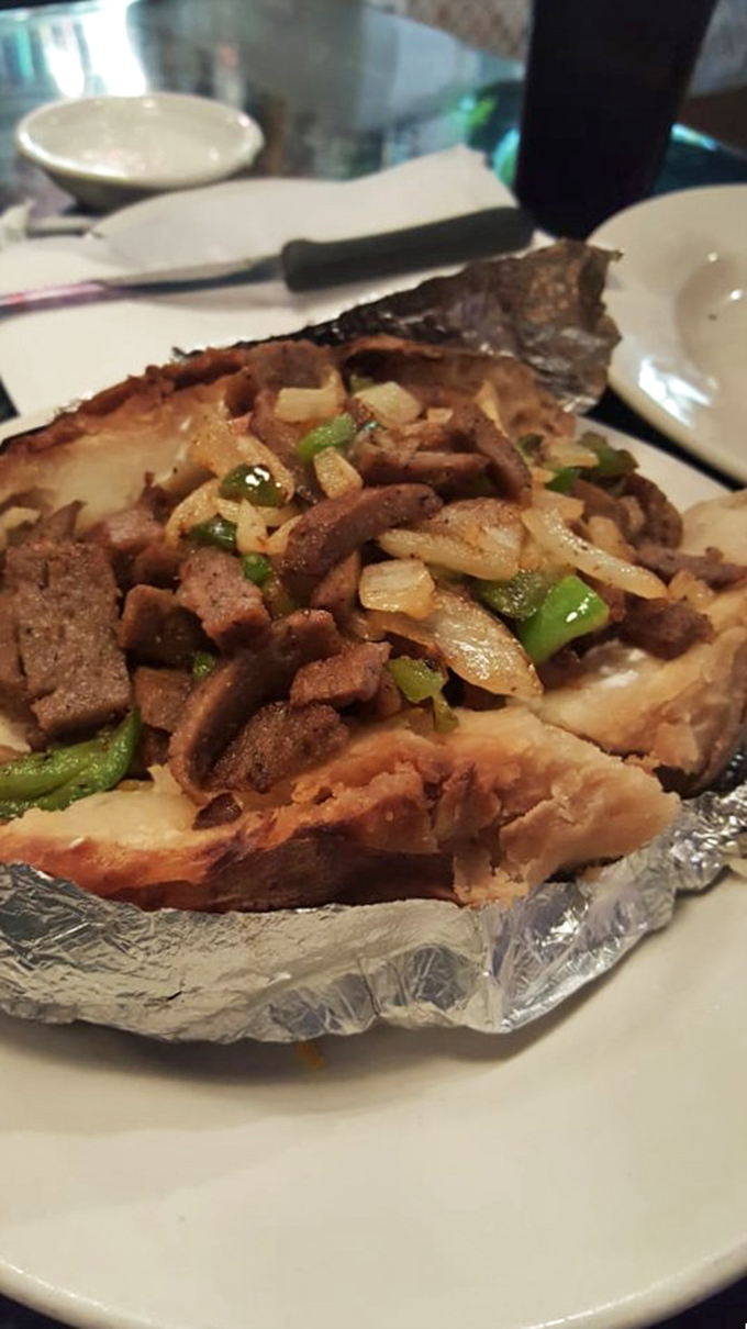 A love affair between gyro meat and potato. Like Romeo and Juliet, if they lived happily ever after on a bed of saut&eacute;ed peppers and onions.