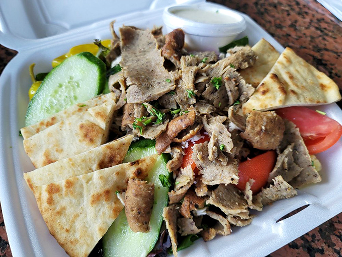 This gyro salad proves that "healthy option" and "absolutely delicious" aren't mutually exclusive concepts. Those pita triangles are bonus treasures.