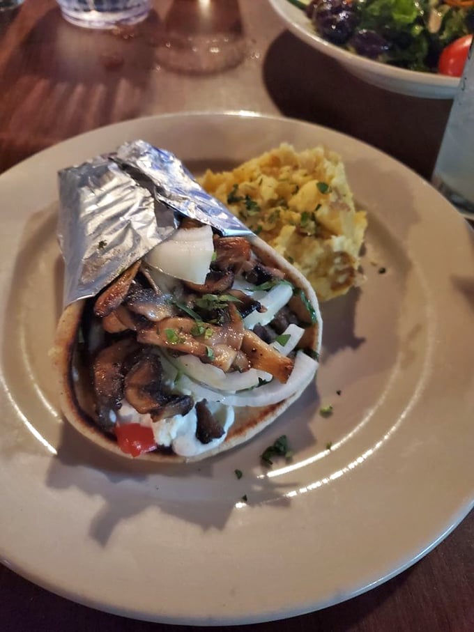 The mushroom gyro &ndash; where fungi get the five-star treatment they deserve, nestled in a warm pita blanket with all the proper accessories.