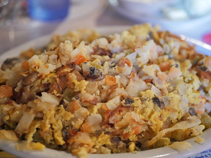 The Hobo Omelet: where eggs meet enough fillings to constitute a small farmer's market. Your fork will need a workout plan after this.