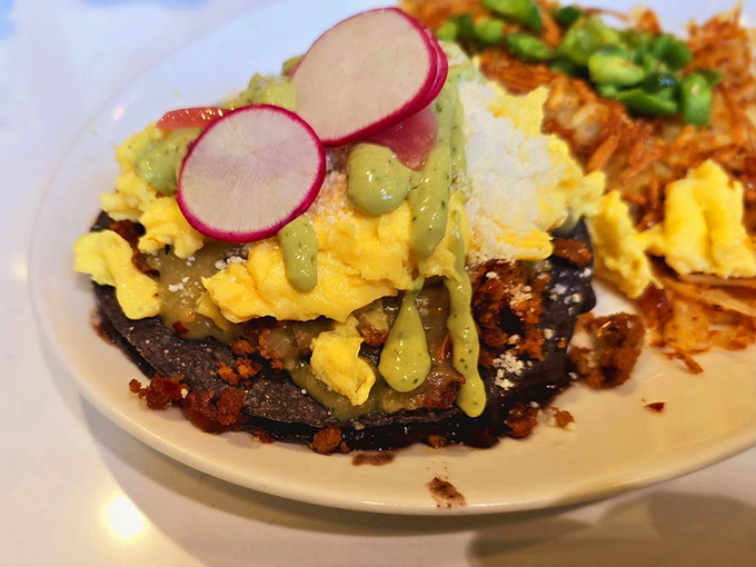 Breakfast architecture at its finest&mdash;layers of flavor stacked higher than your weekend to-do list, topped with perfectly placed radish coins.