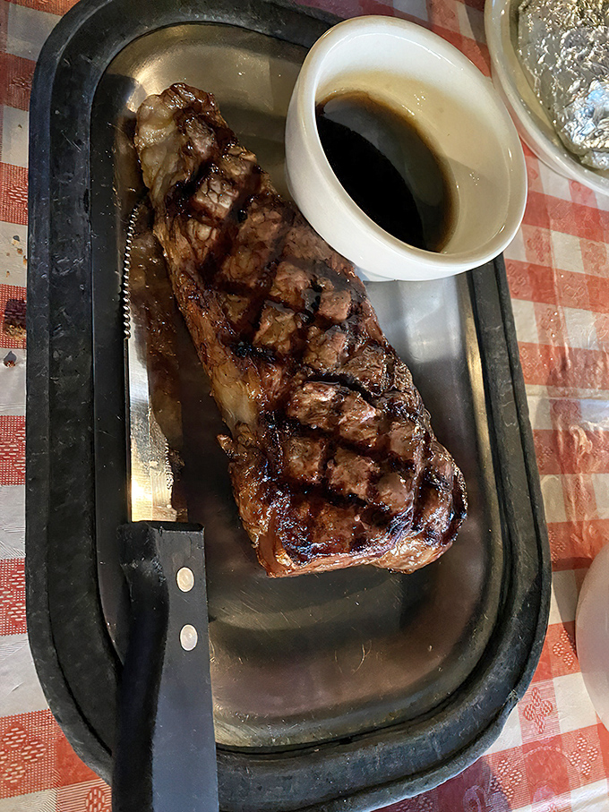 This isn't just a steak&mdash;it's a Kansas City strip with perfect grill marks that whispers, "Life is too short for mediocre beef."