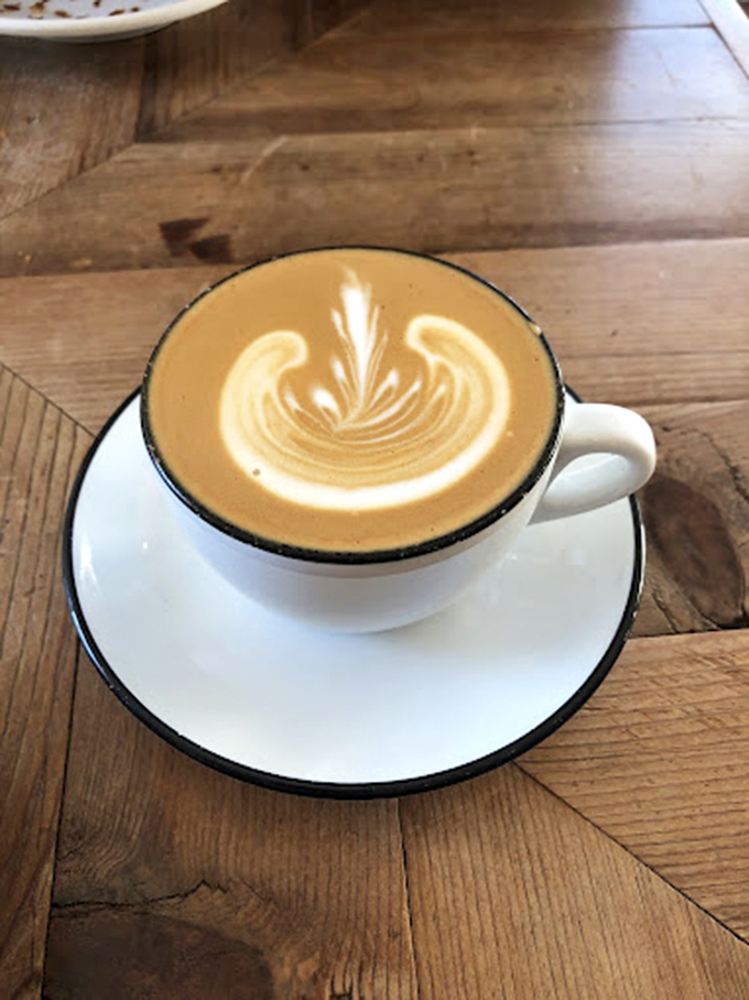 Coffee as art form &ndash; this latte's delicate leaf pattern isn't just Instagram bait, it's the signature of someone who truly cares about your morning ritual.