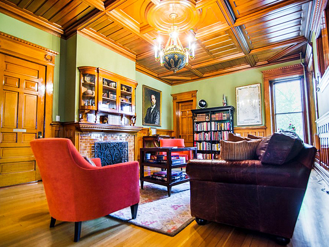 The library's rich wood paneling and leather furniture create the perfect spot to pretend you're sophisticated enough to understand Proust.
