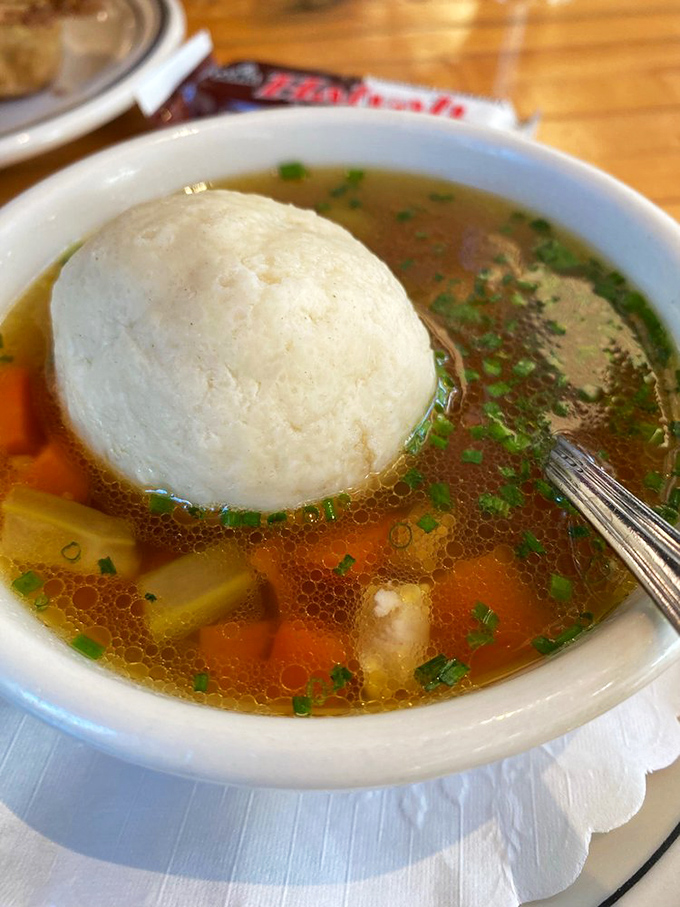 The matzo ball&mdash;perfectly buoyant yet substantial&mdash;holds court in a broth so clear and flavorful it could heal whatever ails you.