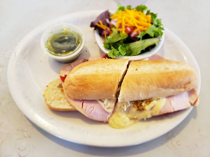 This loaded sandwich doesn't just satisfy hunger &ndash; it eliminates it entirely. Fresh bread, quality ingredients, and a side salad for those pretending to be virtuous.