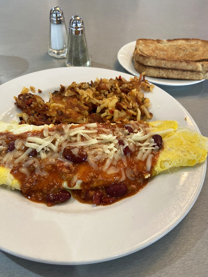 The Mexican omelet brings south-of-the-border flavors wrapped in egg perfection. That chili topping isn't just garnish &ndash; it's a flavor revolution.