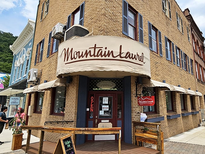 Mountain Laurel's corner spot has been witnessing downtown gossip for generations. The awning alone deserves its own historical marker.