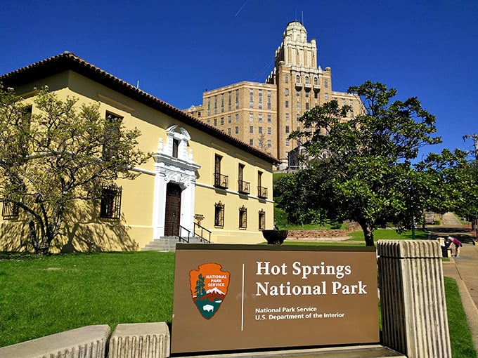 Hot Springs National Park's entrance sign quietly announces one of America's most accessible natural wonders &ndash; no wilderness survival skills required!