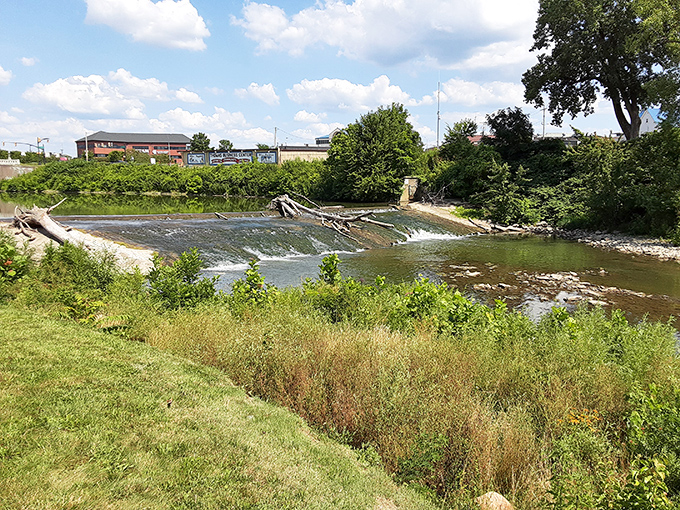 The White River flows through Muncie like a liquid timeline, connecting the city's industrial past with its nature-embracing present.