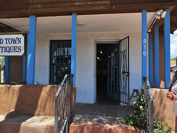 Old Town Antiques embraces Albuquerque's adobe aesthetic, with those signature blue posts standing guard over yesterday's treasures.