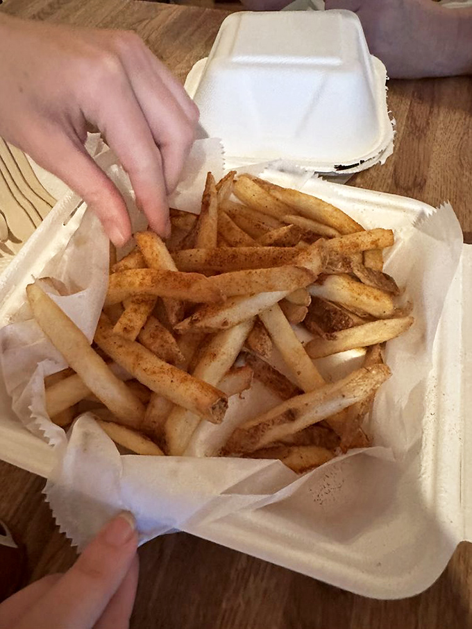 These aren't just fries&mdash;they're potato vessels for delivering Old Bay seasoning directly to your soul. Worth every napkin you'll need afterward.