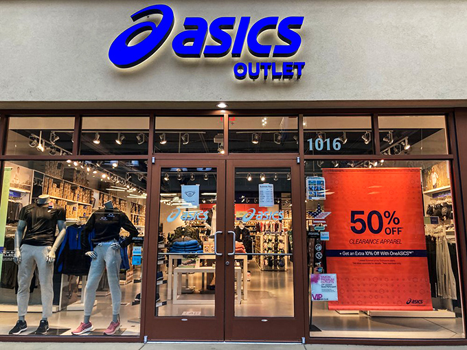 ASICS outlet window displays promise that perfect running shoe &ndash; the one that might finally convince you that exercise isn't just something other people do.