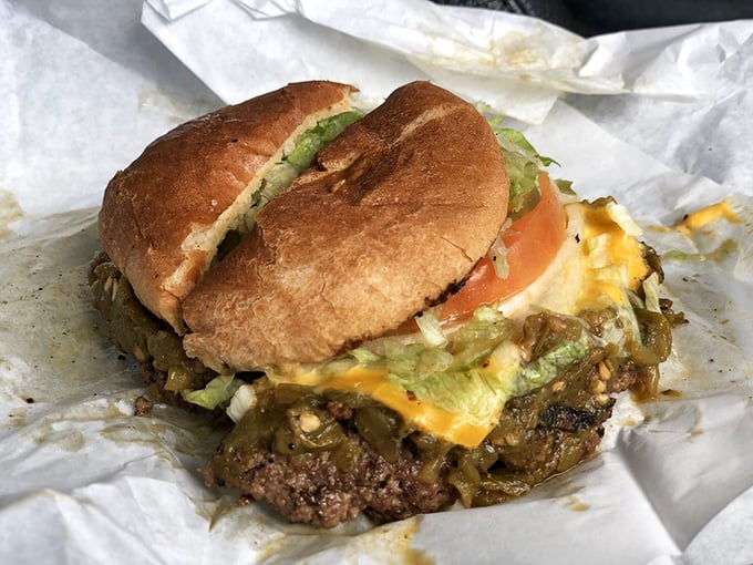 Unwrapping this green chile cheeseburger feels like Christmas morning for your taste buds. The paper wrapper barely contains the masterpiece within.