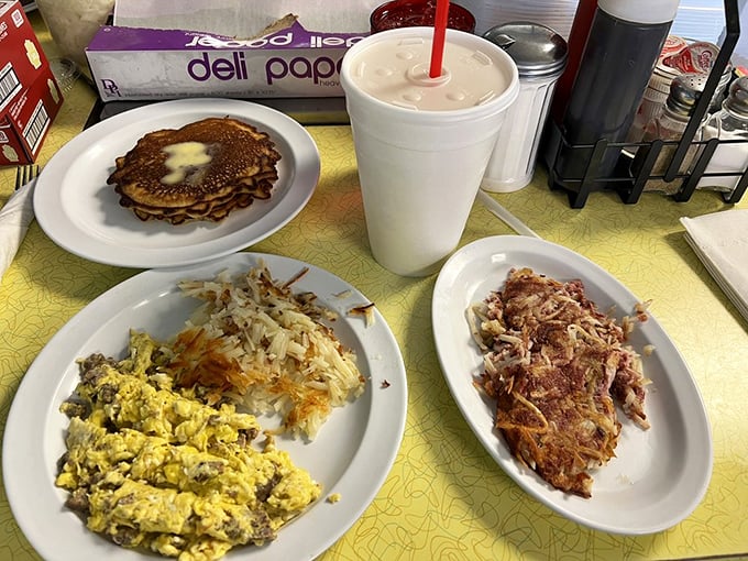 Pancakes golden as sunrise alongside savory delights. This plate doesn't just feed your body&mdash;it nourishes your very soul. 