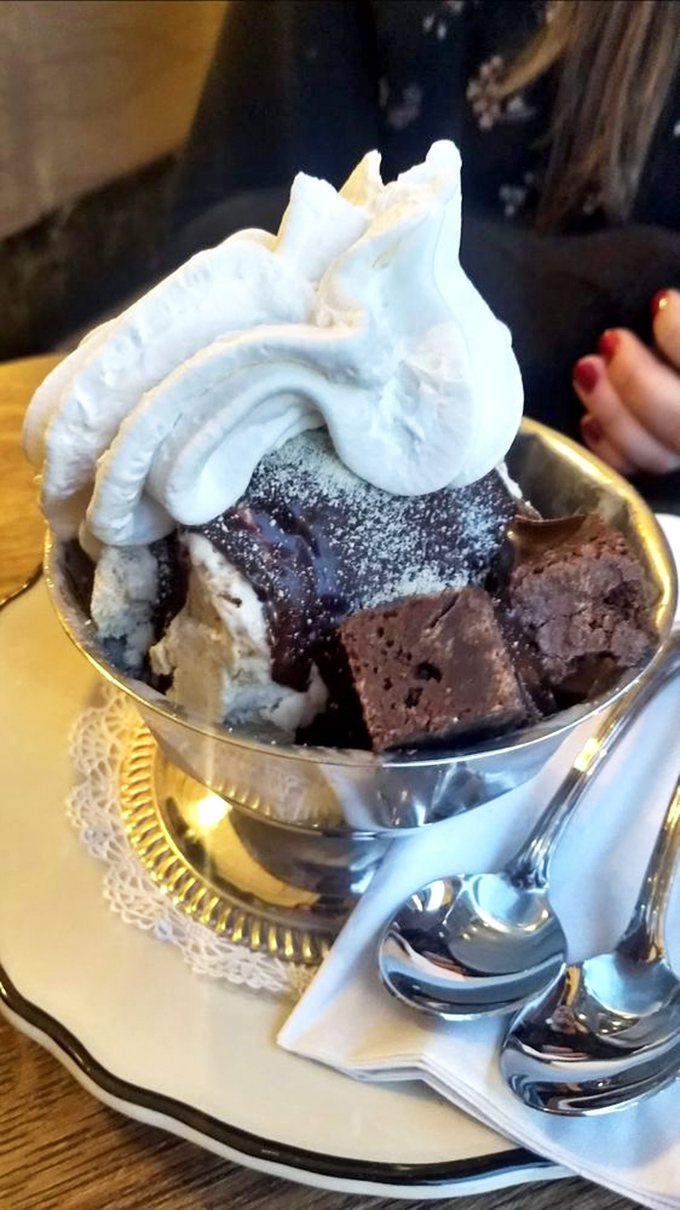 Pecans and whipped cream create a cloud-like canopy over this sundae. Spoon required, restraint optional. 