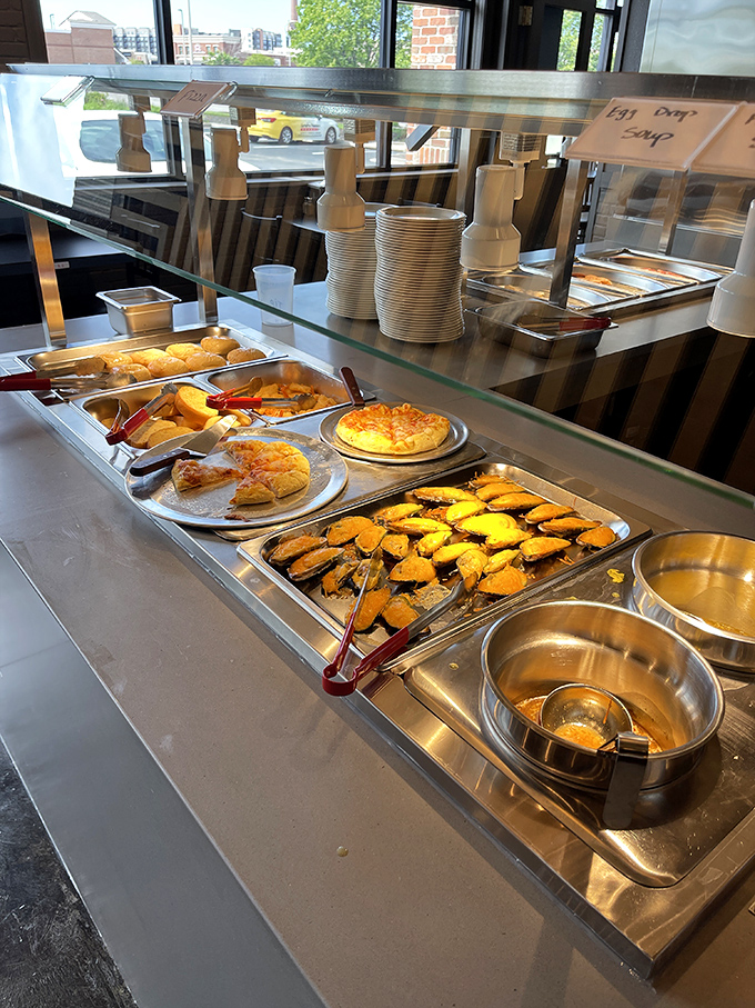 The pizza and fried offerings station&mdash;where diet plans go to die and happiness is born. Worth every delicious calorie.